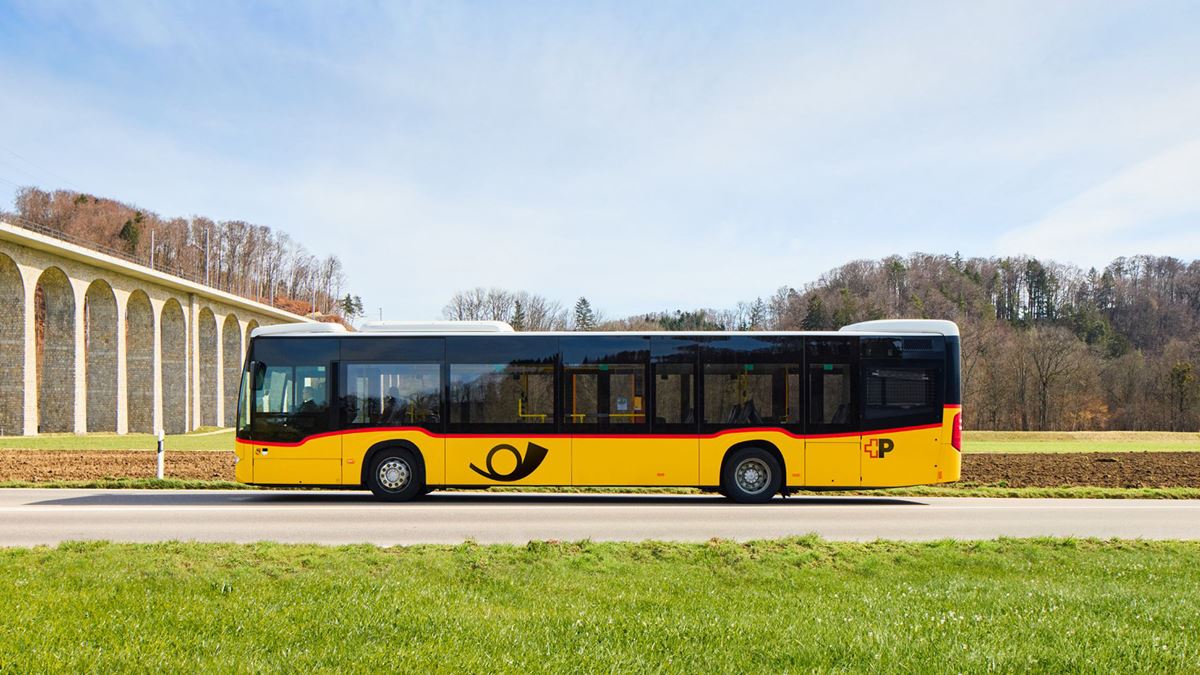 Common visual identity with modernized logo for Swiss Post and PostBus.